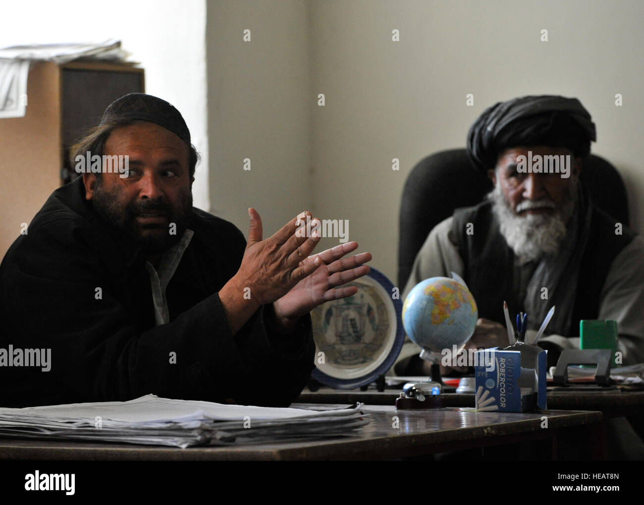 District leader Abdull Sahab attends a meeting with International ...