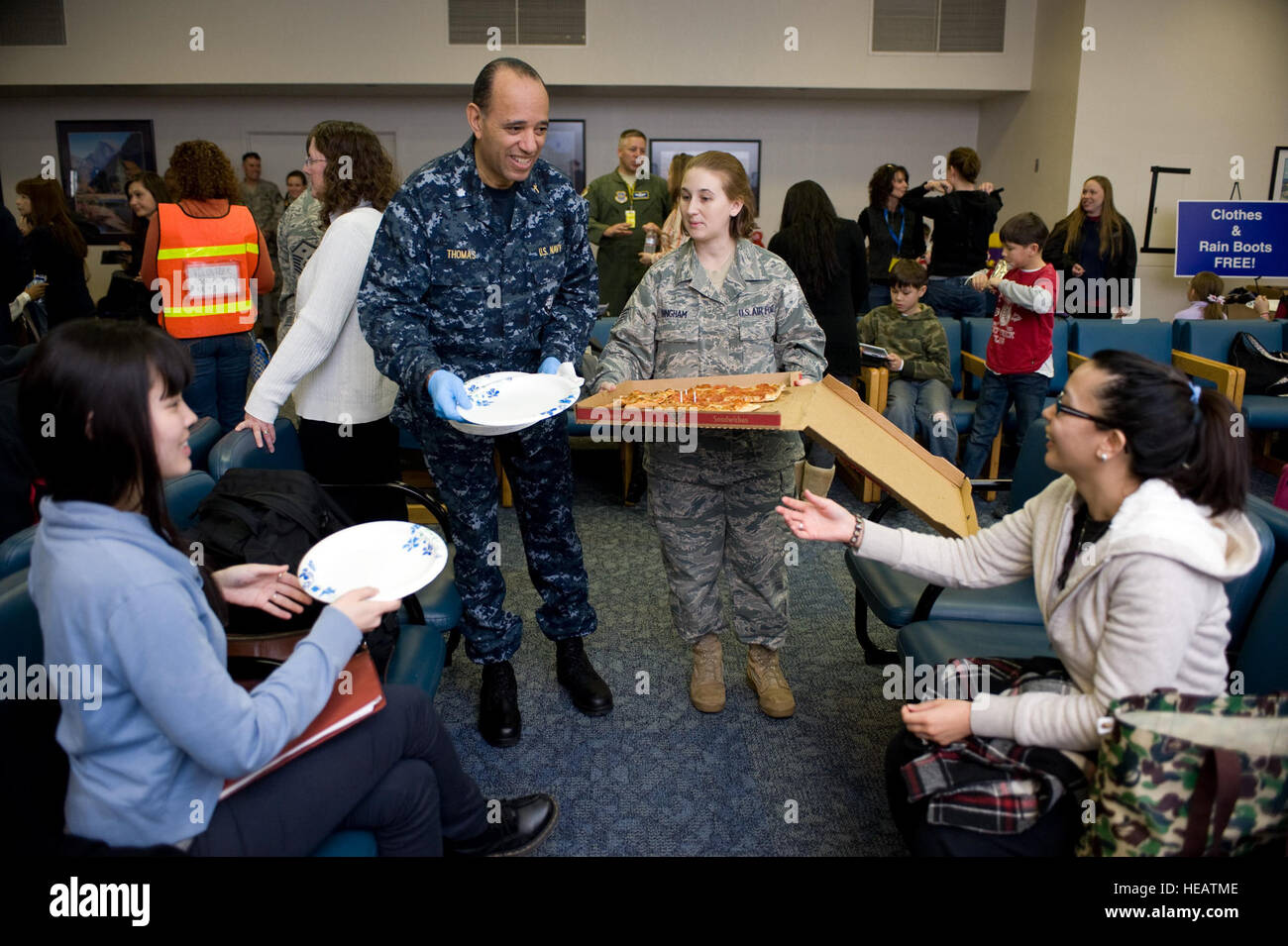 Military family members arrive at Travis Air Force Base from Japan ...