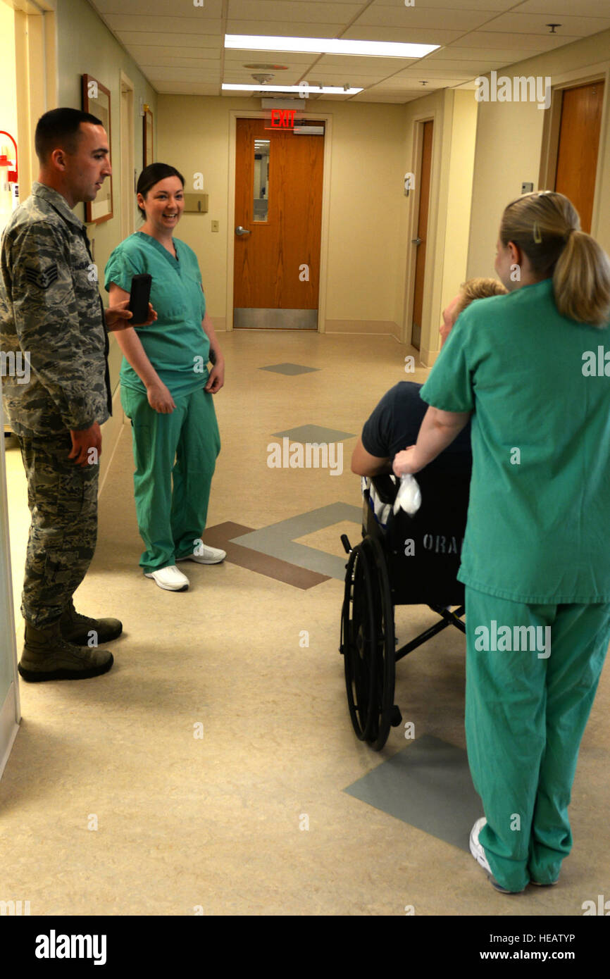 Maegan Wallinger rolls a patient out after a wisdom teeth extraction ...