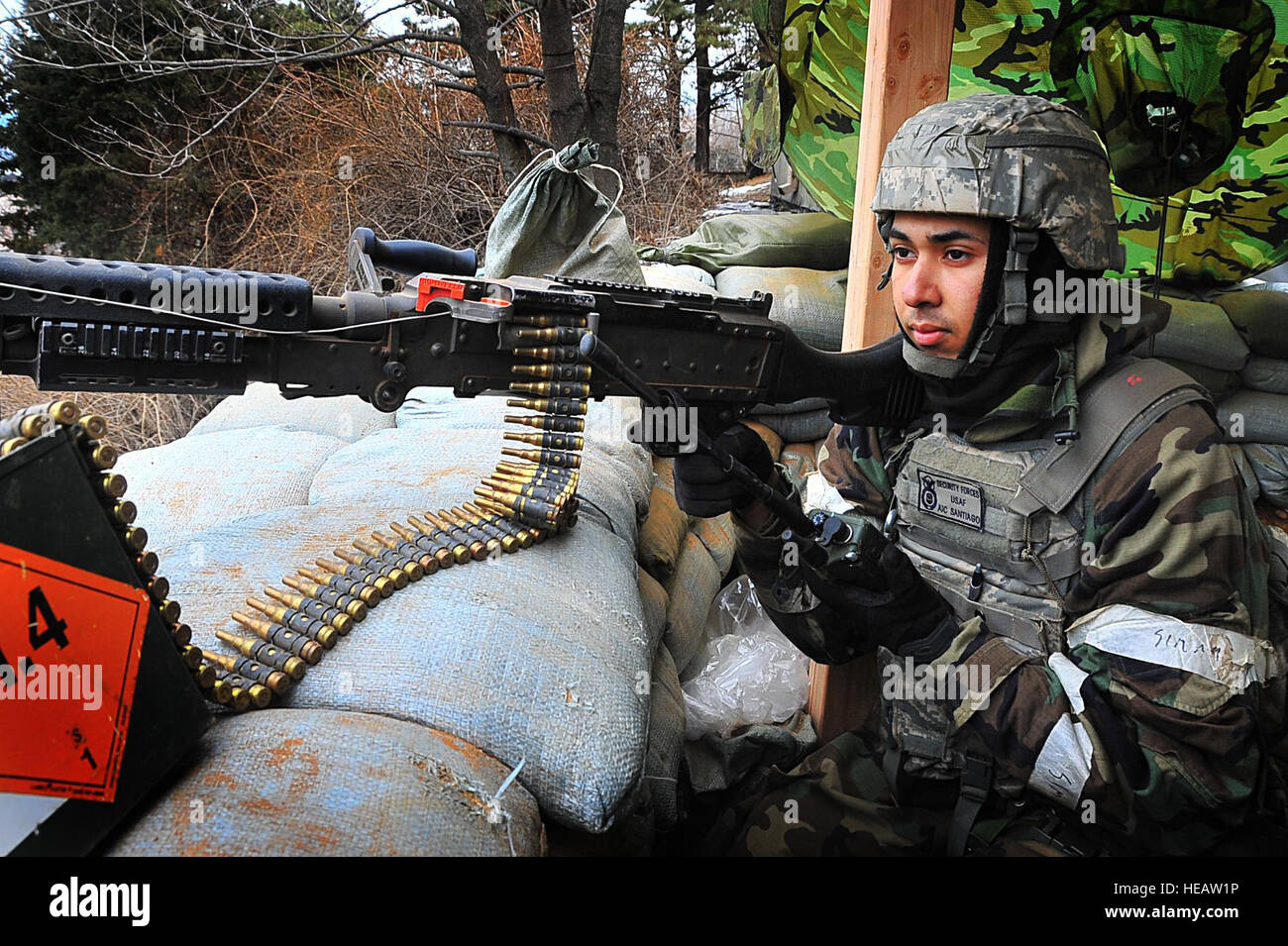 A 51st Fighter Wing Security Forces airmen secure the access point to ...