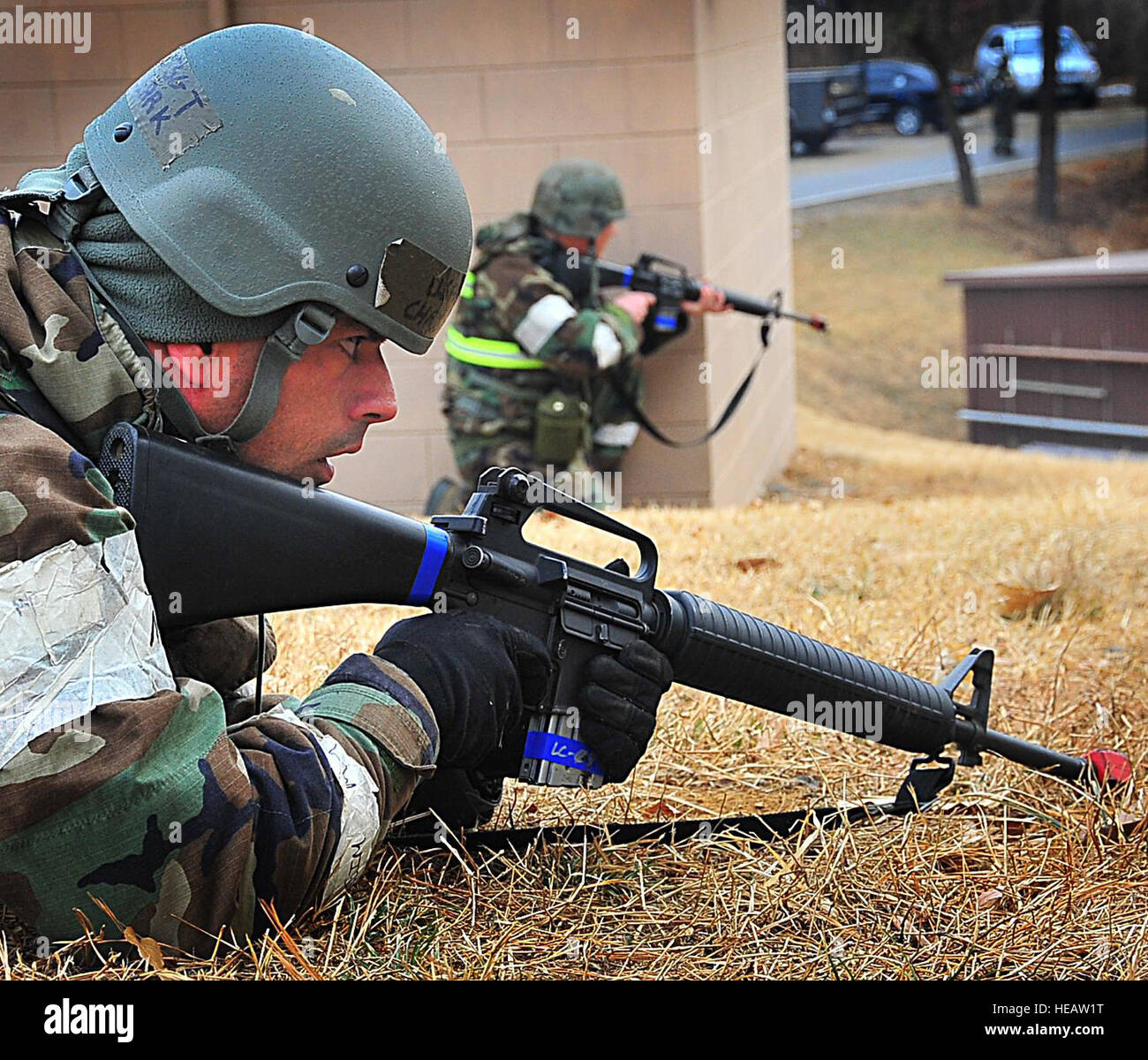 A 51st Fighter Wing Security Forces airmen secure the access point to ...