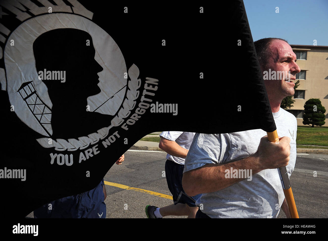 Airmen from the 51st Maintenance Operations Flight run in formation ...