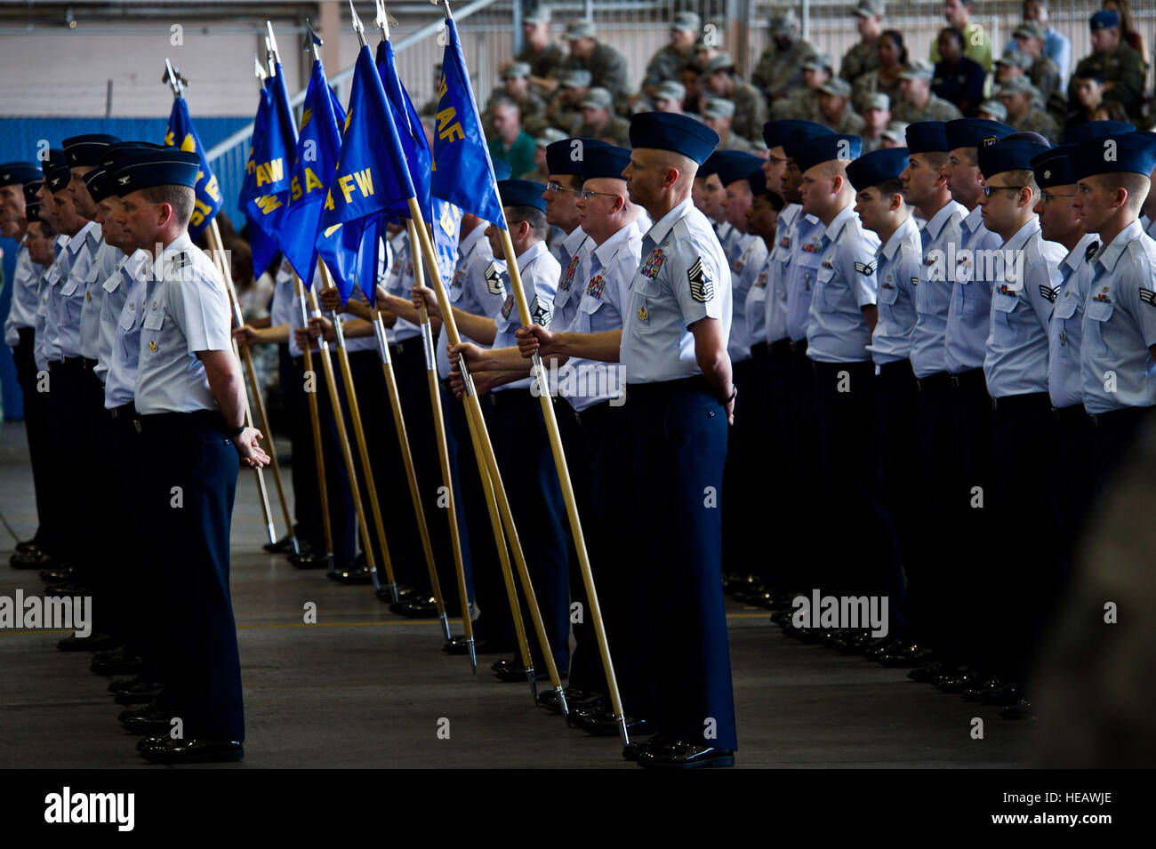 U.S. Air Force airmen assigned to Pacific Air Forces (PACAF) stand in ...