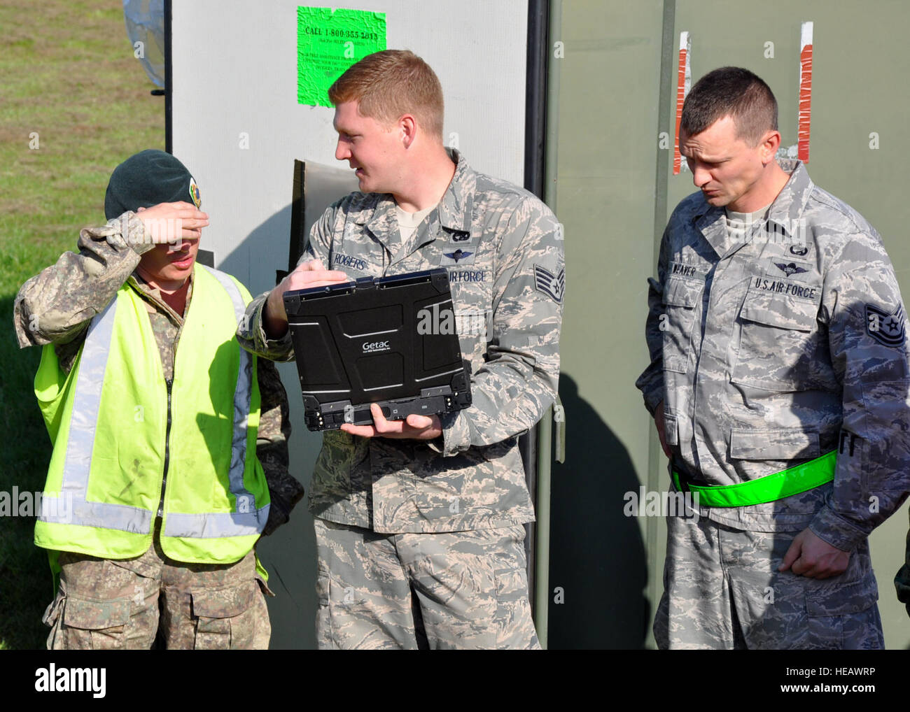 (Left to right) New Zealand Army Staff Sgt. Peter Baker, rigger and ...