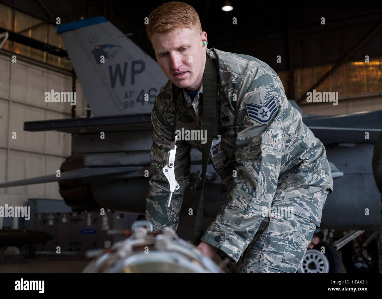Staff Sgt. Colley Abston, 35th Aircraft Maintenance Unit weapons load ...
