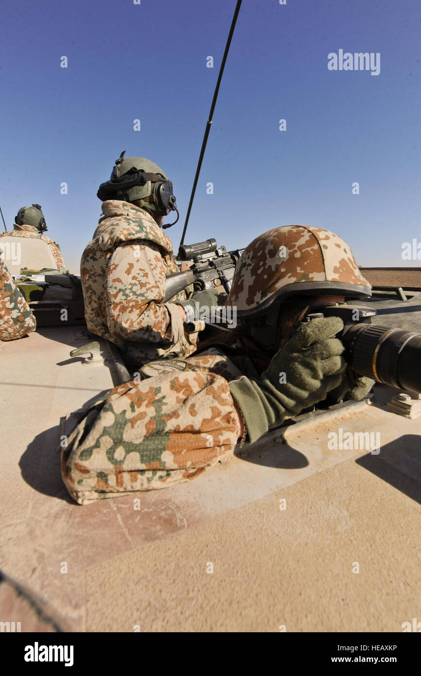 Danish Capt. Jeanette Serritzlev with the Battle Group Center documents ...