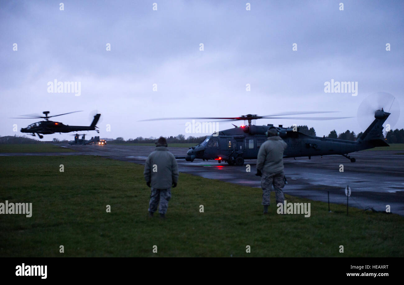 Crew Chiefs from the 56th Rescue Squadron observe an HH-60G Pave Hawk ...