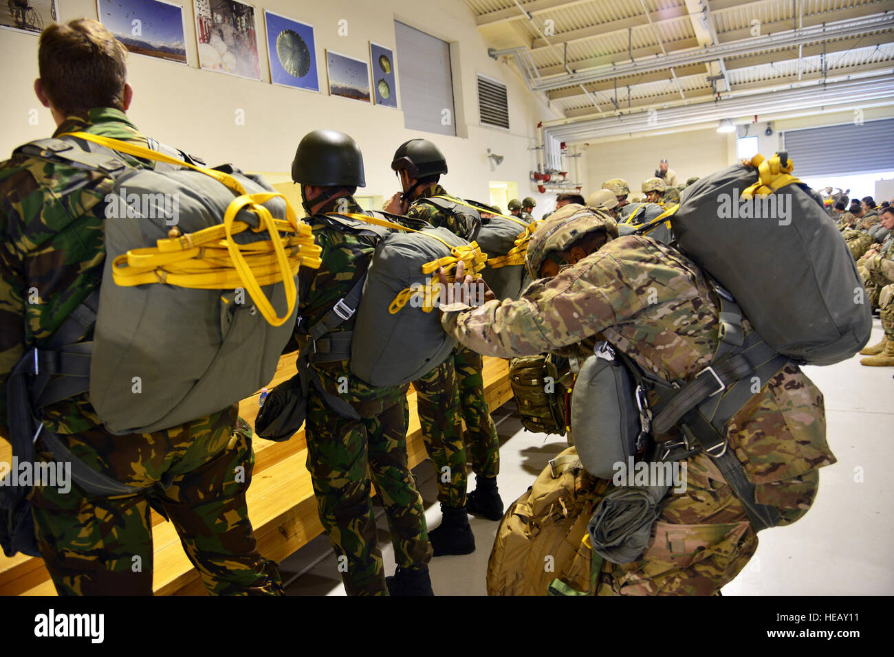 U.S. Army Staff Sgt. Alexis A. Forchiney, a jumpmaster assigned to the ...
