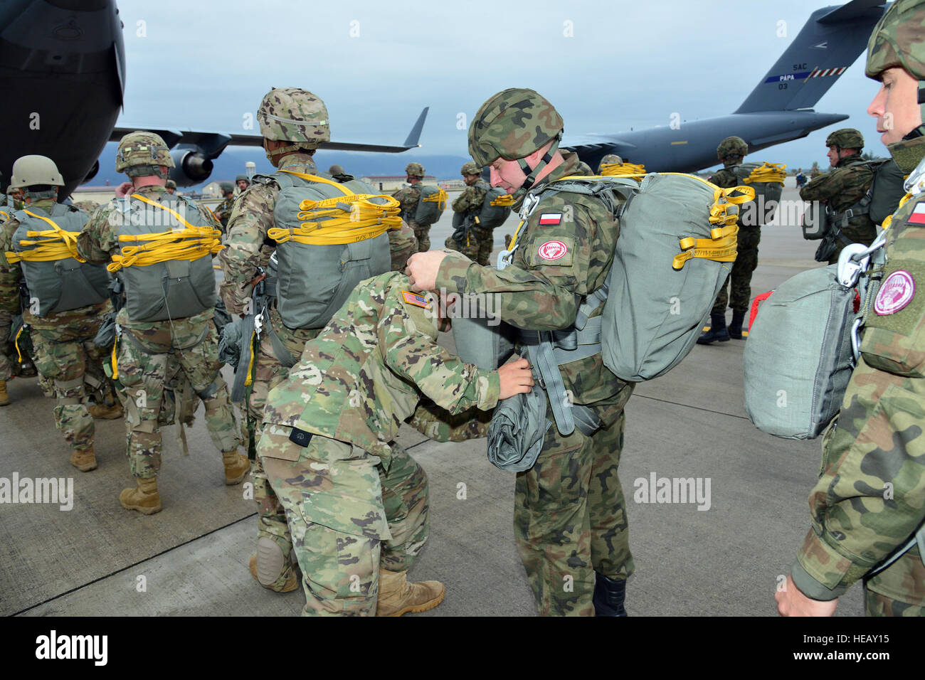 U.S. Army 1st Lt. David Blum, left, a jumpmaster assigned to the 54th ...