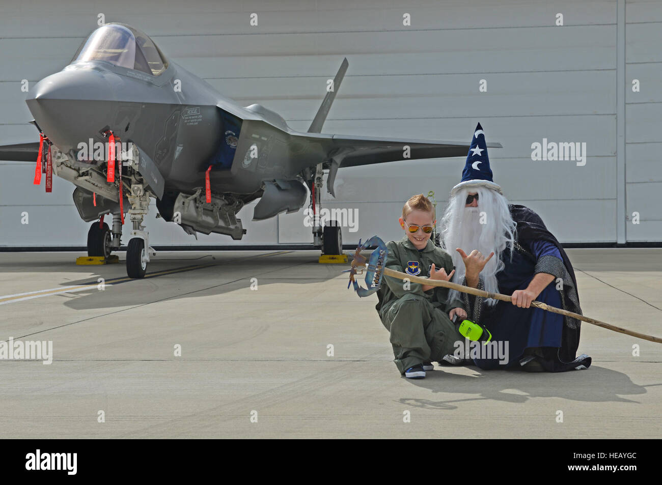 The 33rd Maintenance Squadron’s wizard mascot kneels in front of an F ...