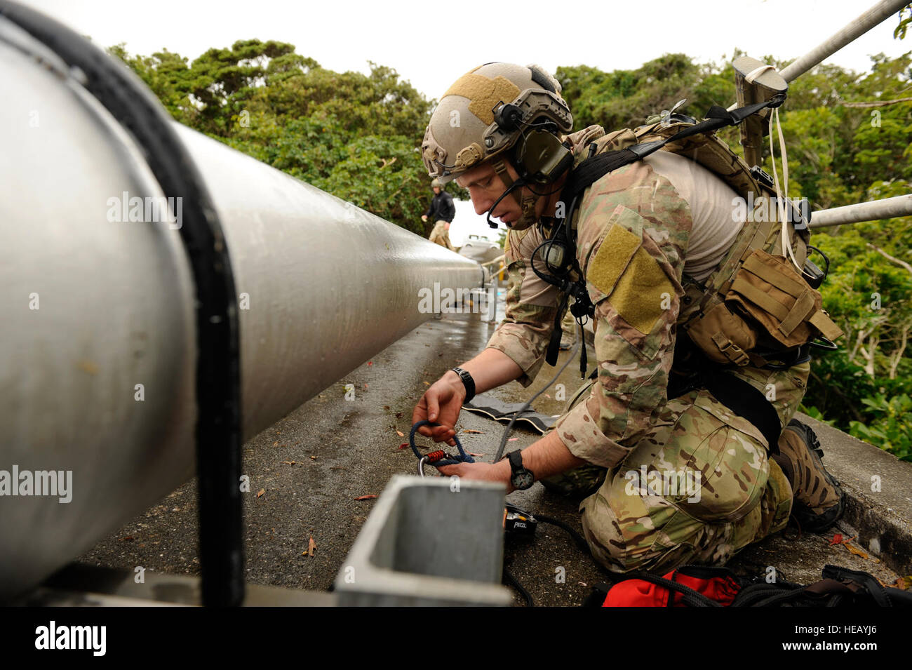 A U.S. Air Force pararescueman from the 31st Rescue Squadron prepares a ...