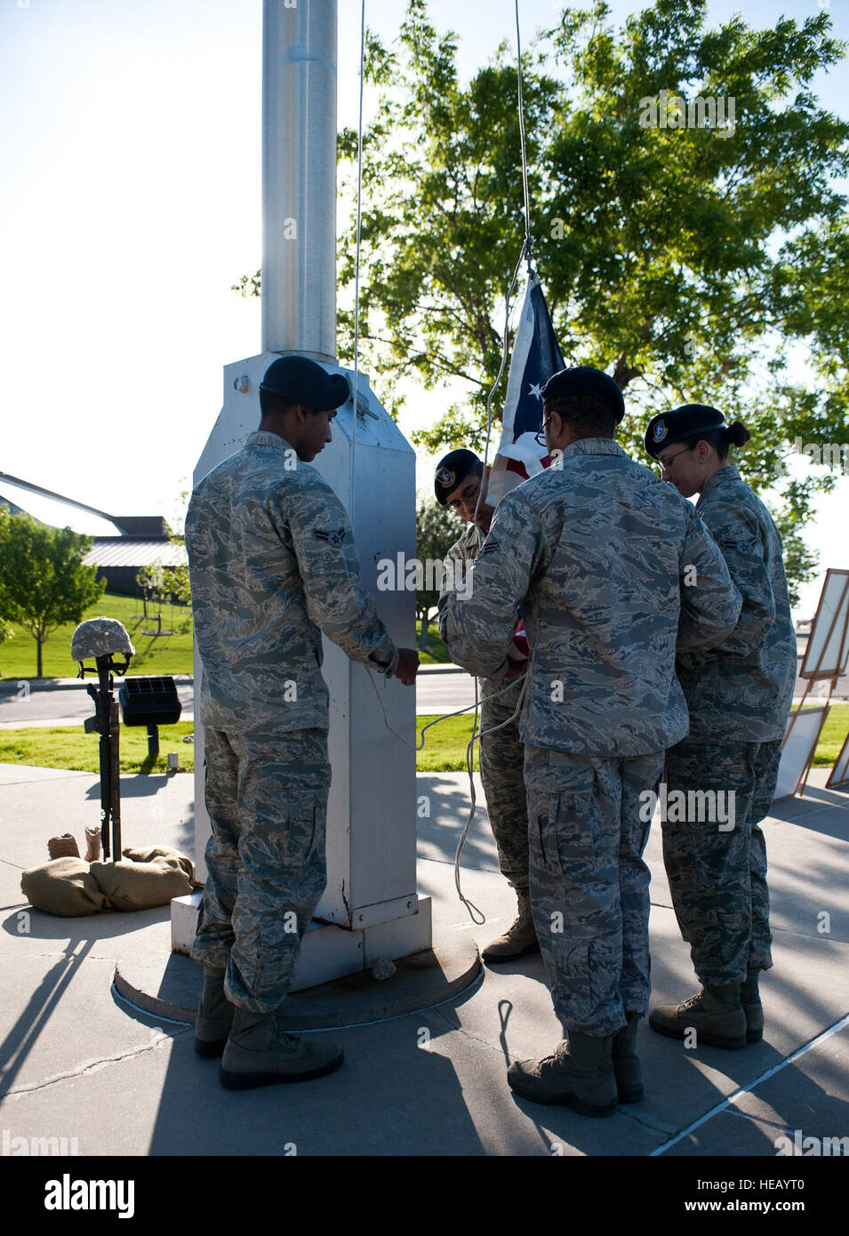 28th Security Forces Squadron airmen conduct a flag memorial detail at ...