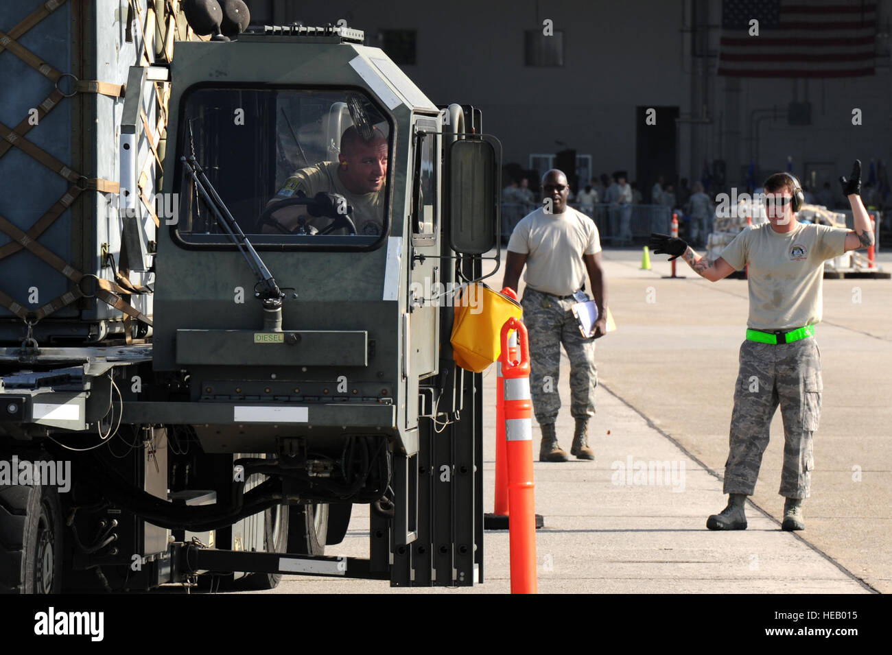 U.S. Air Force Staff Sgt. Brady Frasier, left, is guided by Tech Sgt ...