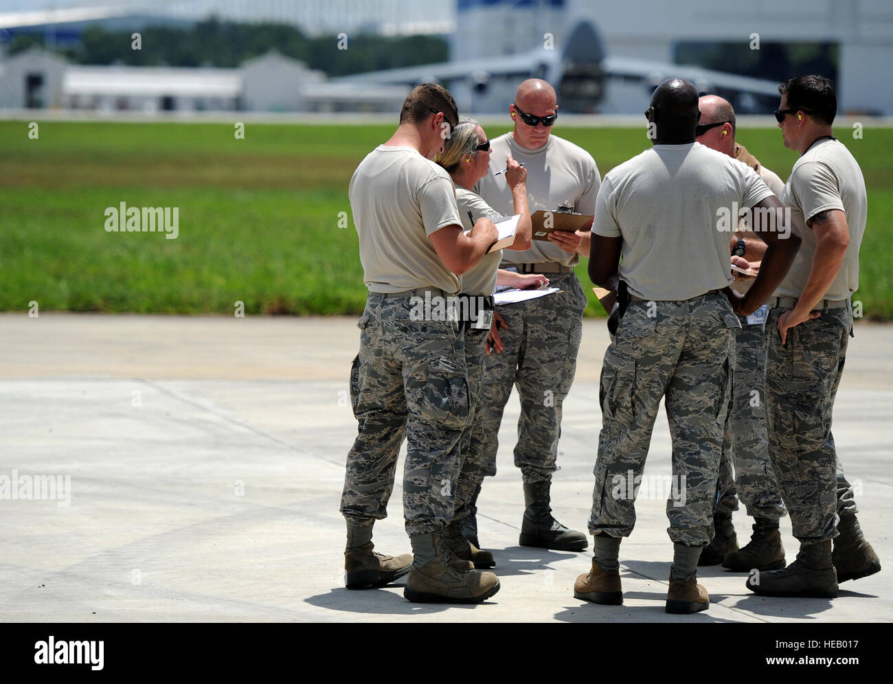 A group of U.S. Air Force judges discuss the recent competitors on the ...