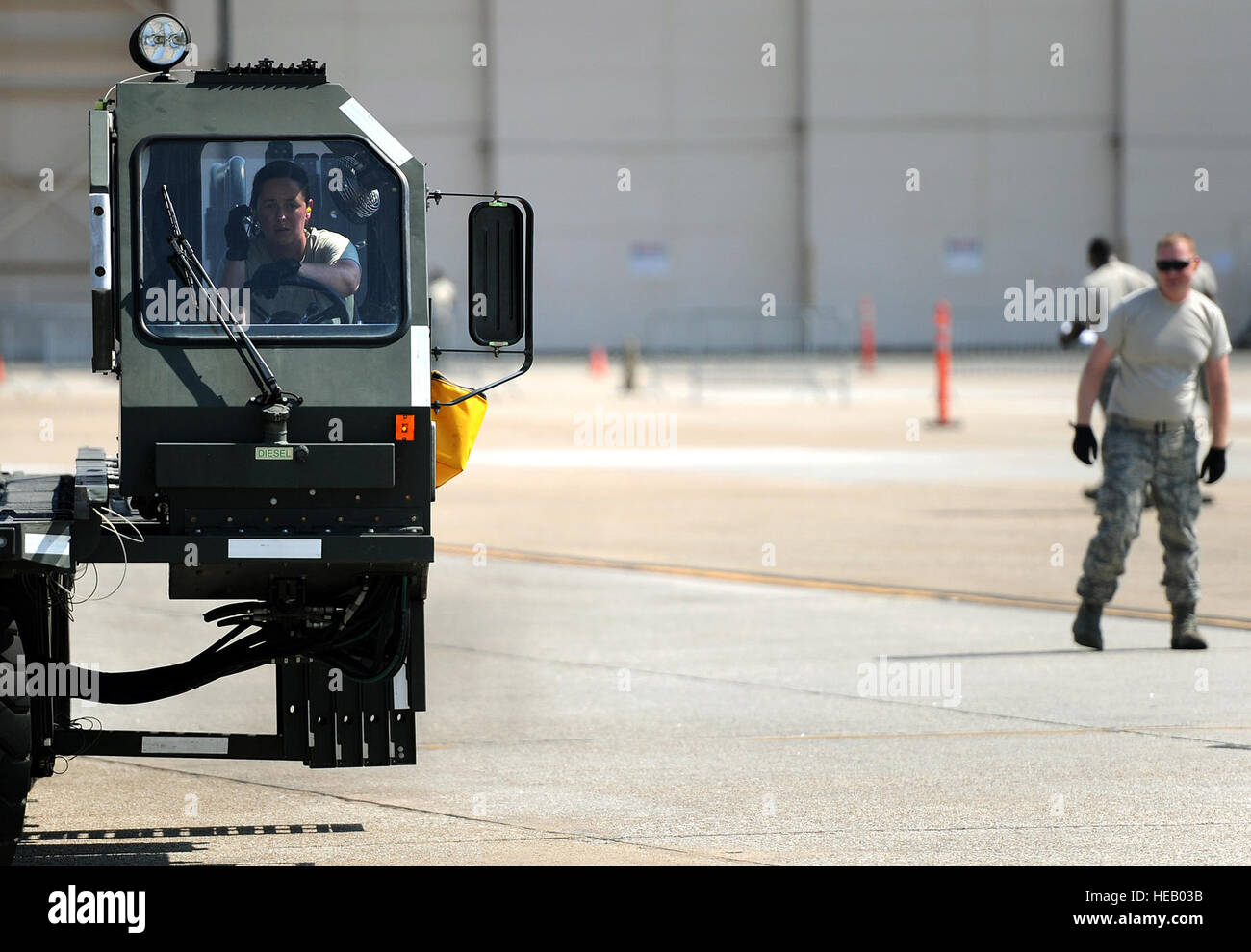An Airman from the 80th Aerial Port Squadron operates a 25K Halverson ...