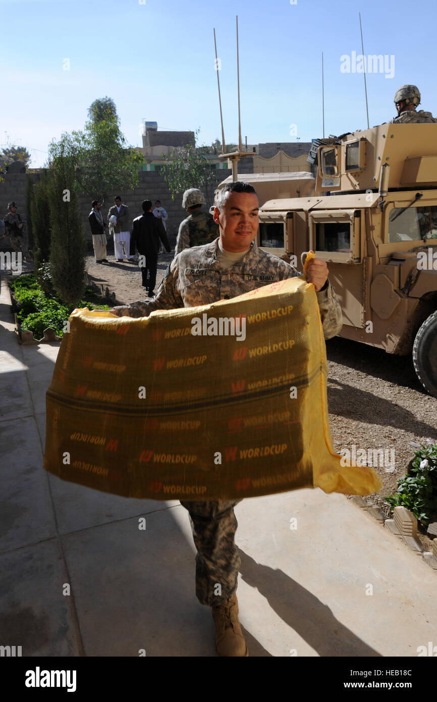 On December 23, 2009, U.S. Army civil affairs personnel with the Farah ...