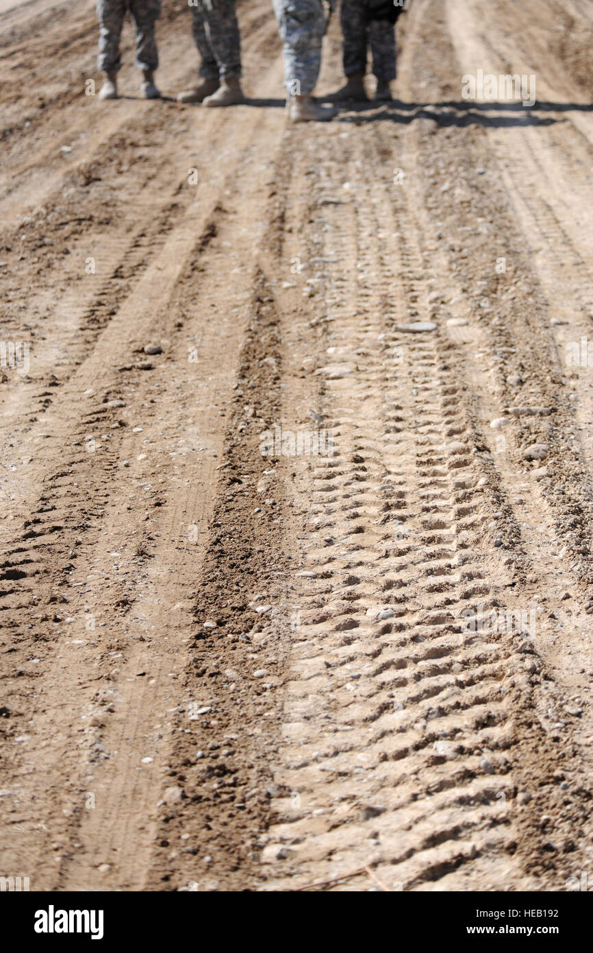 Members of the Farah Provincial Reconstruction Team (PRT) stand on a ...