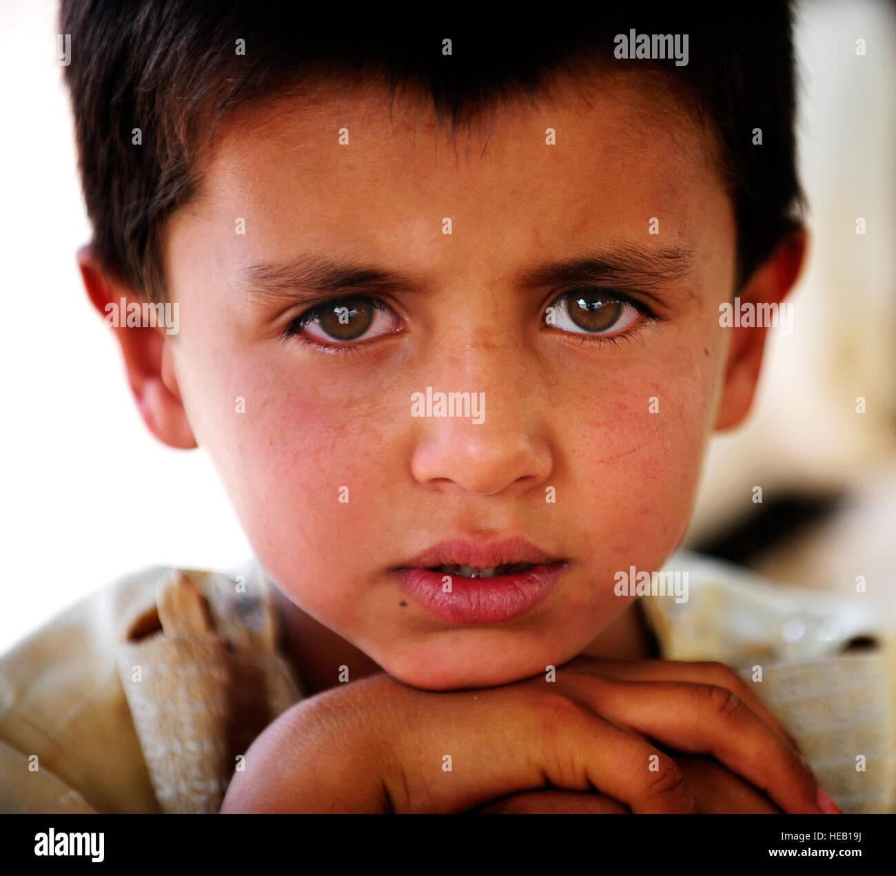 An young Afghan boy poses for a photograph during a Provincial ...