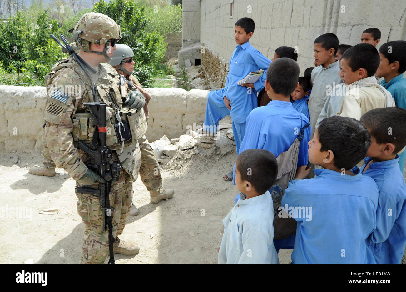 Navy Lt. Cmdr. Benjamin Cone, a native of Issaquah, Wis., speaks with a ...