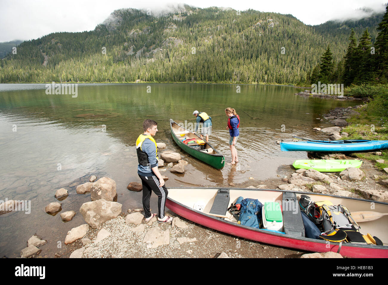 A group of canoe campers push off for a trip across Callaghan Lake ...
