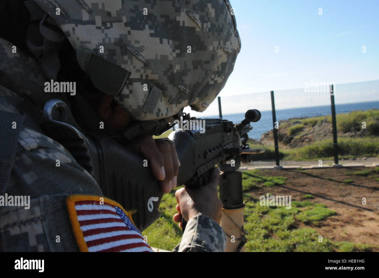GUANTANAMO BAY, Cuba – Spc. Emily Nieves scans the perimeter while on ...