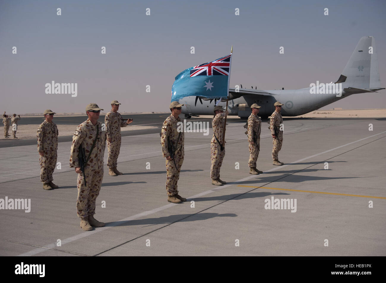A Royal Australian Air Force honor guard from No. 37 Squadron renders ...