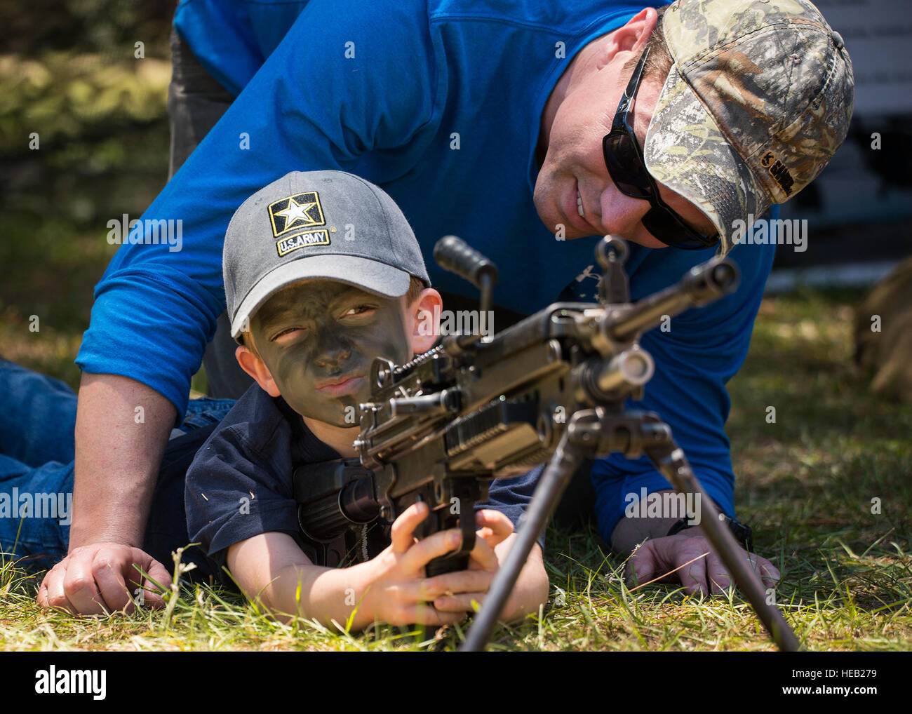 Liam Howard, age 5, aims a machine gun downrange during the 6th Ranger ...