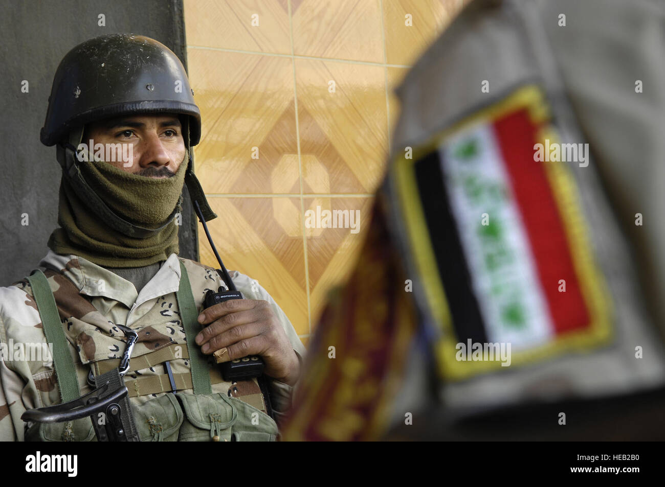 Iraqi army soldiers from 4th Battalion, 2nd Brigade, 5th Division stand ...