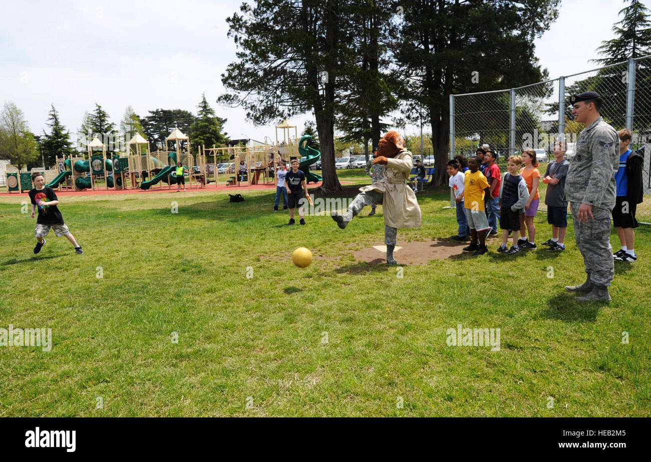 McGruff the Crime Dog plays a game of kickball with Sollars Elementary ...