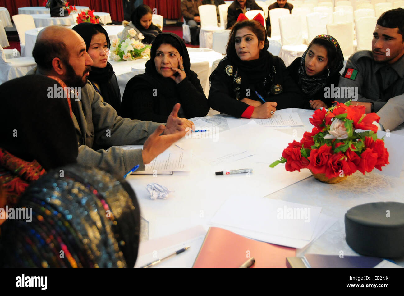 Afghan national police members have a round table discussion during a ...