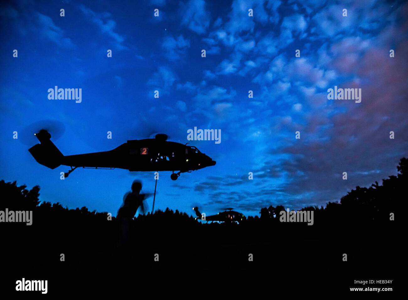 A pair of UH-60 Blackhawk helicopters, Army National Guard Helicopter ...