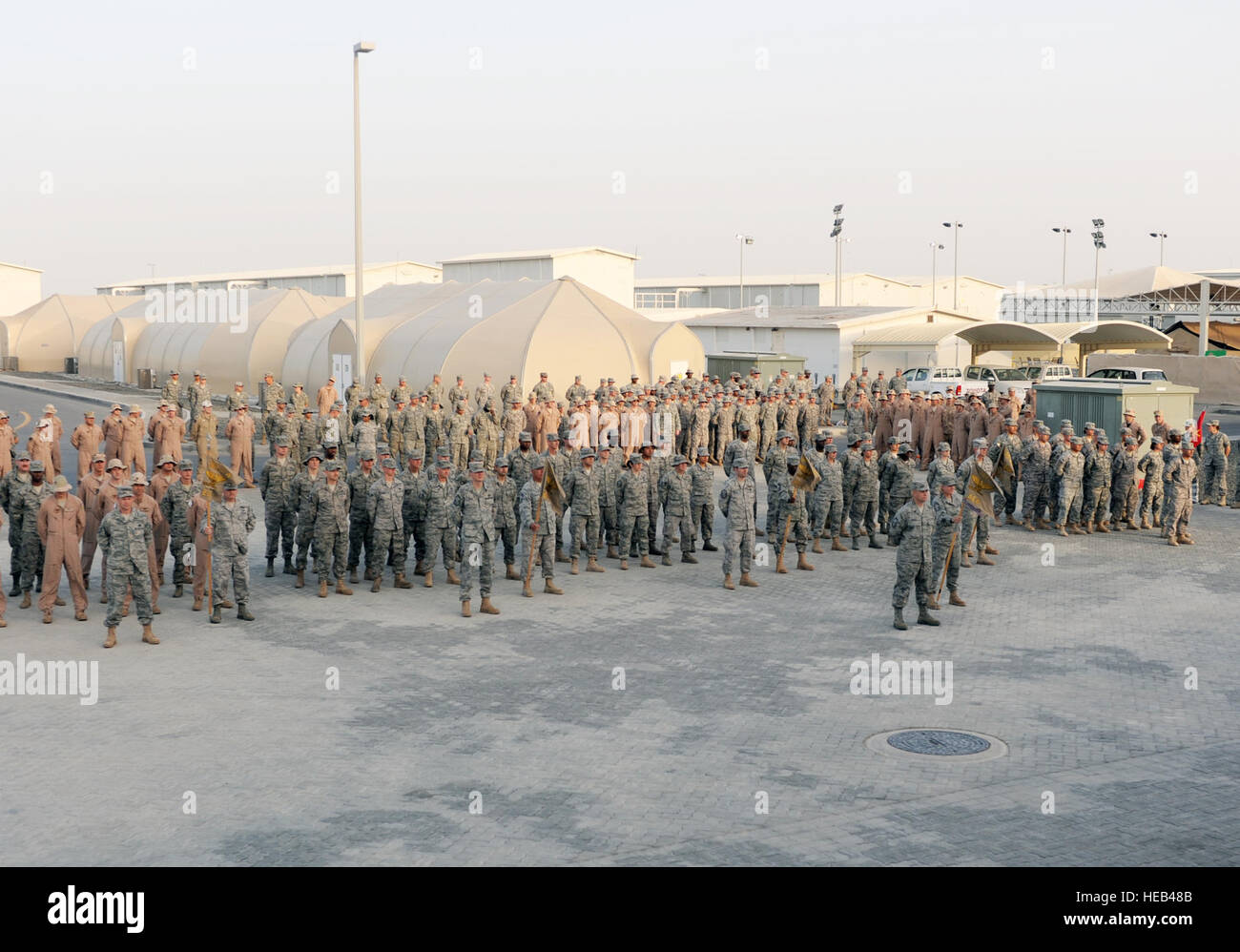 Airmen from the 380th Air Expeditionary Wing participate in a retreat ...