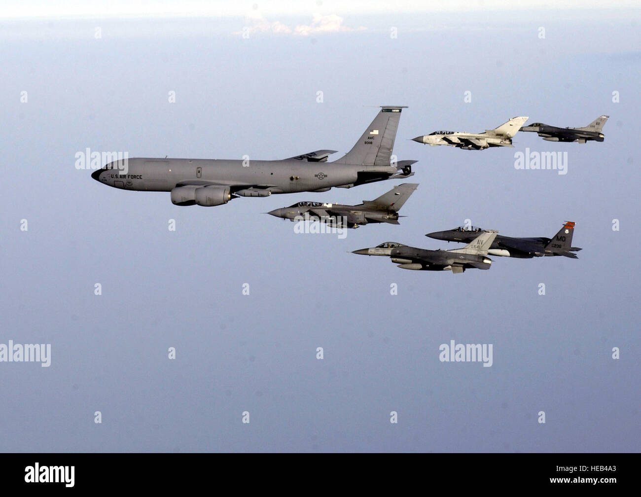 OVER IRAQ -- A KC-135 Stratotanker leads a formation of an F-15 Strike ...