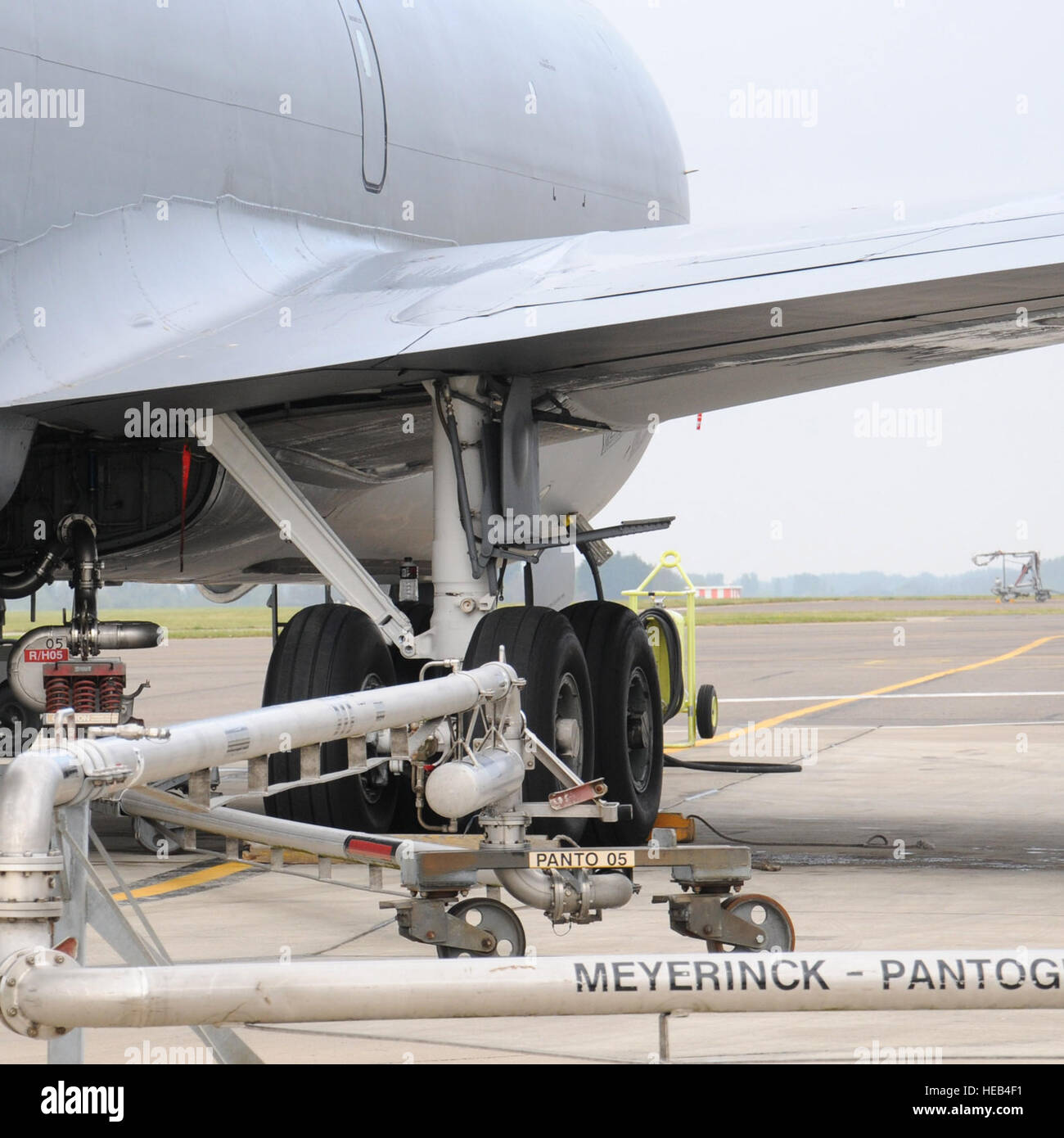 A pantograph allows fuel to flow from underground piping to a transient ...