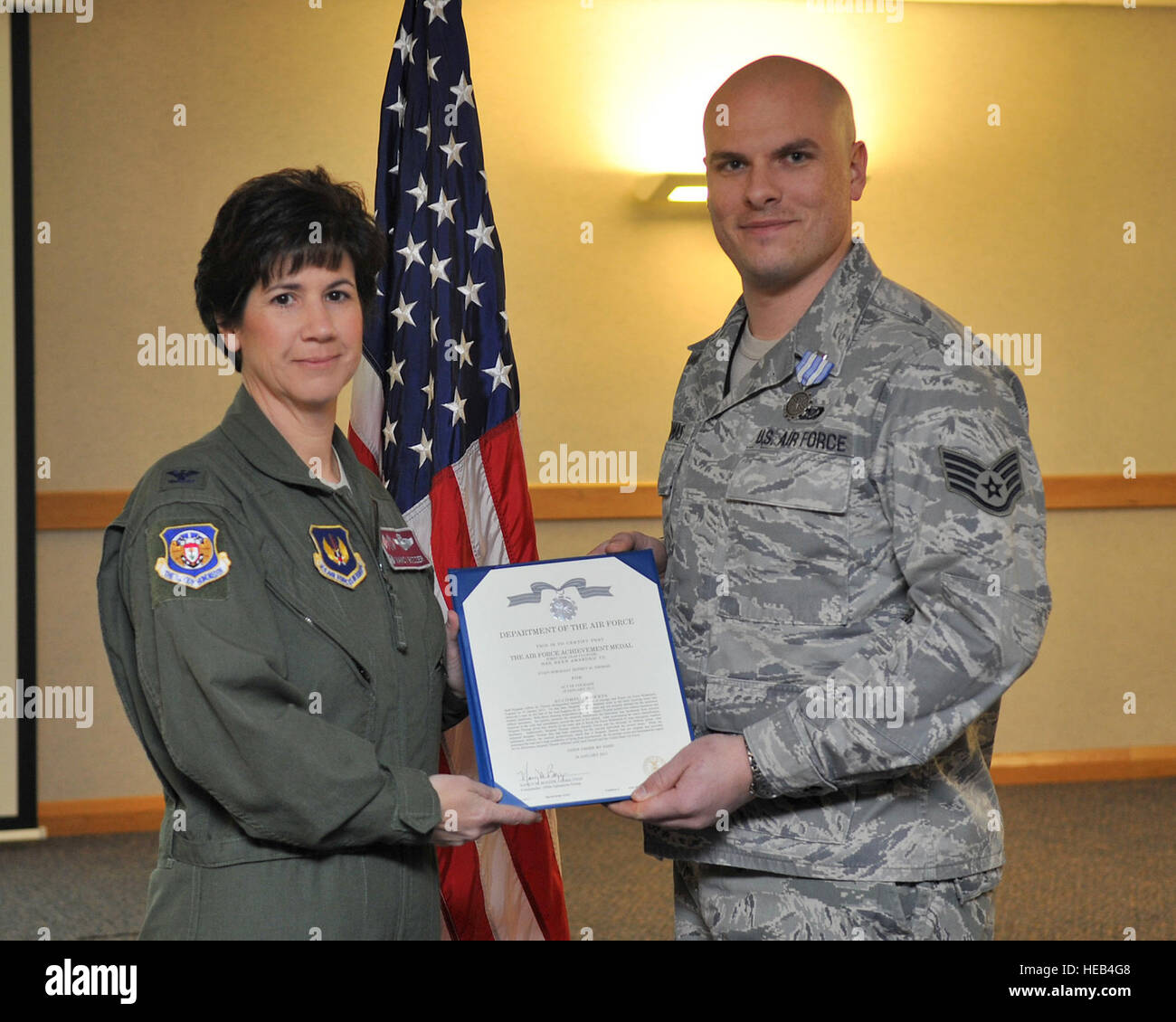 Col. Nancy Bozzer, 100th Operations Group commander, presents the Air ...