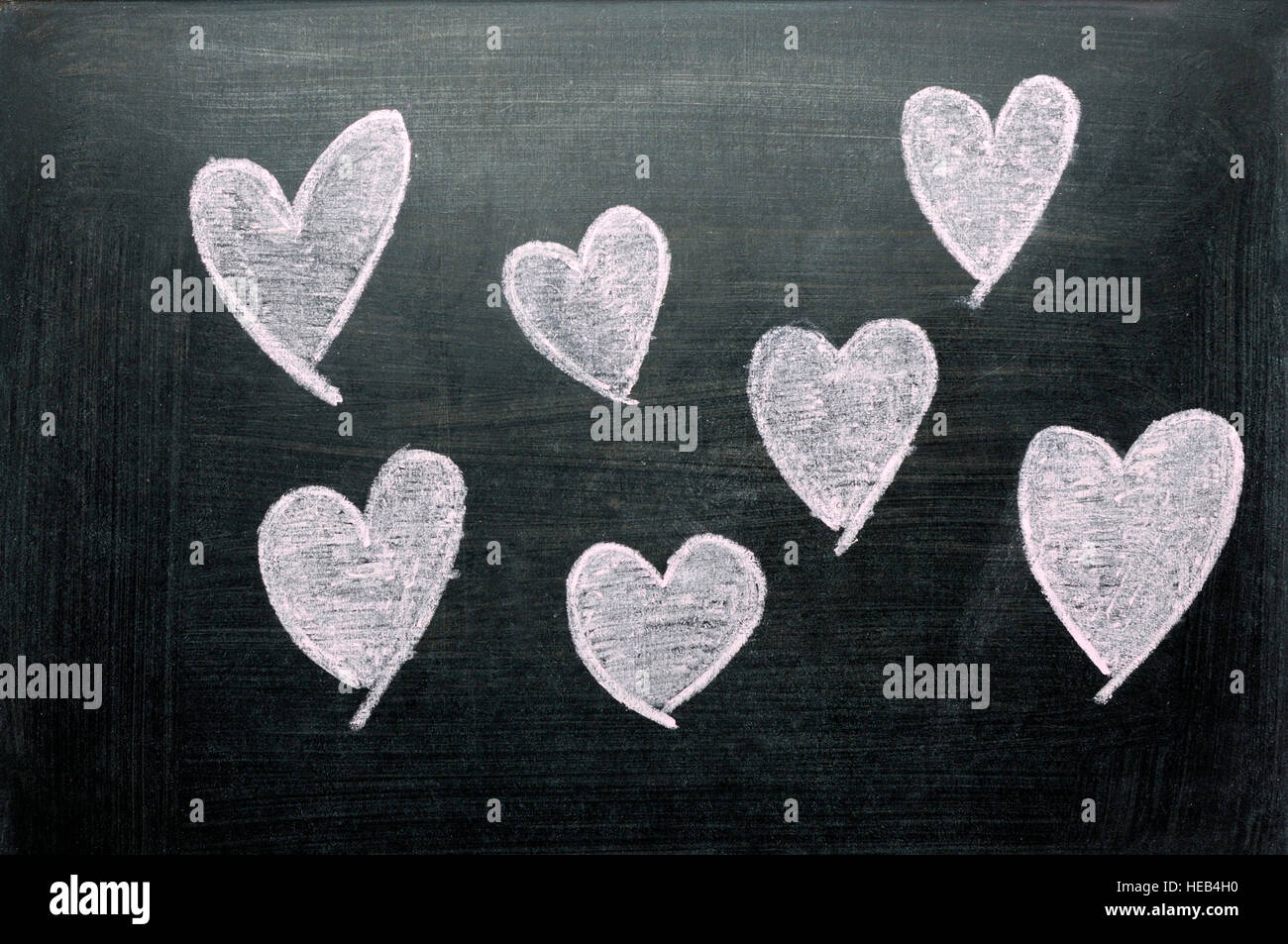 Heart drawing with chalk on the chalkboard Stock Photo - Alamy