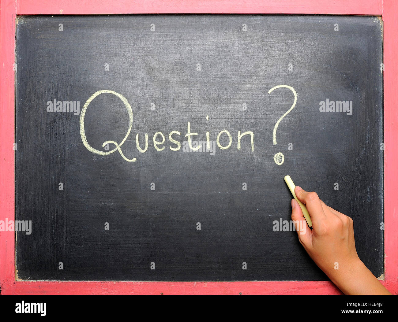 Question handwriting on the black chalkboard background Stock Photo - Alamy