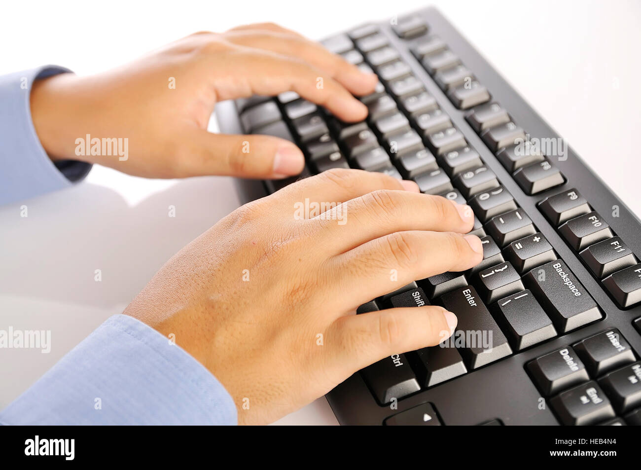 Hands typing on keyboard. This is office environment concept Stock ...