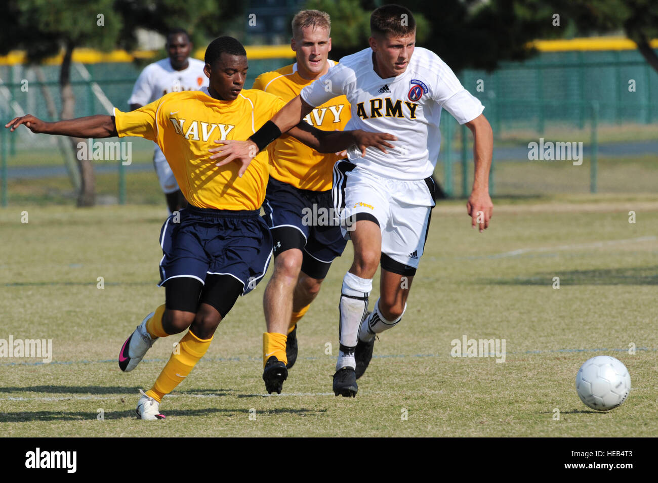 From left, U.S. Navy Seaman Apprentice Kyle Baker, a forward for the ...