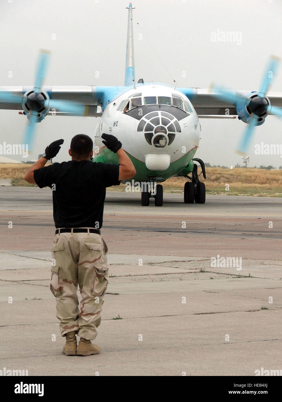 KARSHI-KHANABAD AIR BASE, Uzbekistan -- Staff Sgt. Sammy Ayala gives ...