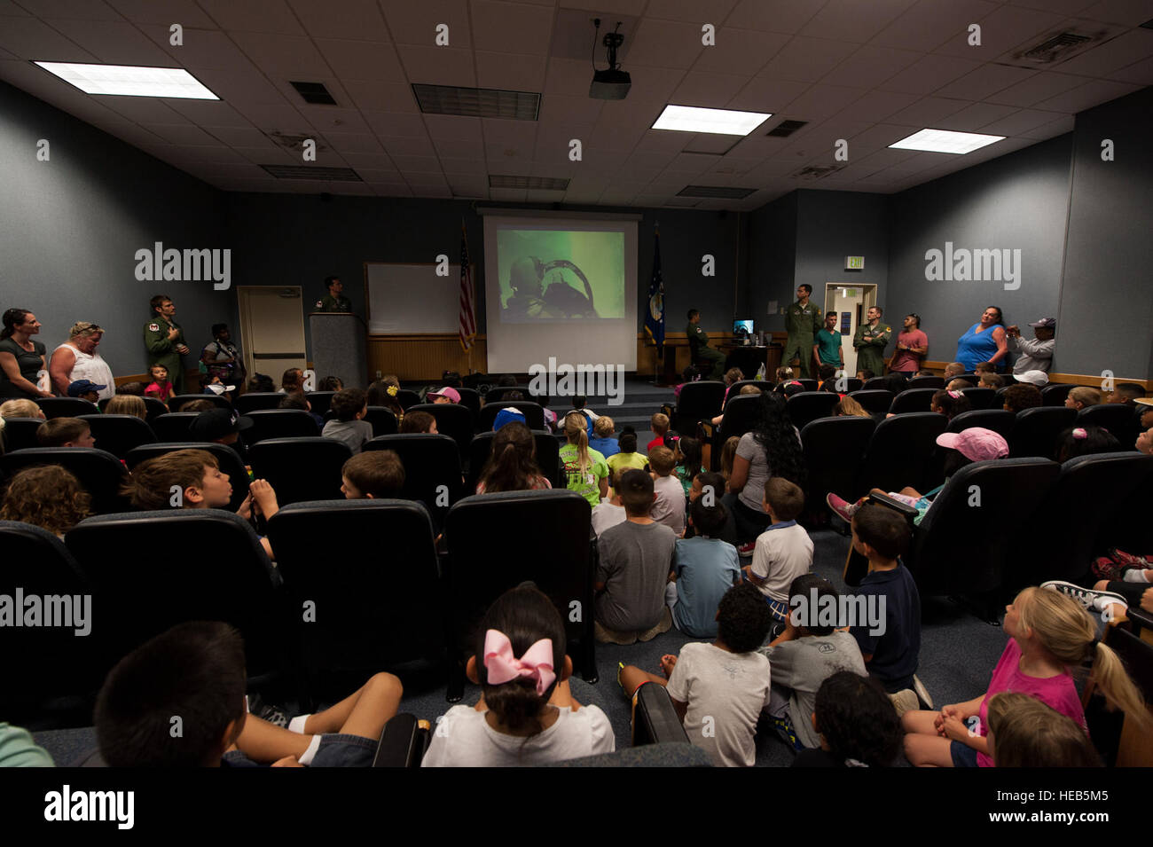 First grade students from Bechtel Elementary School watch a video about ...