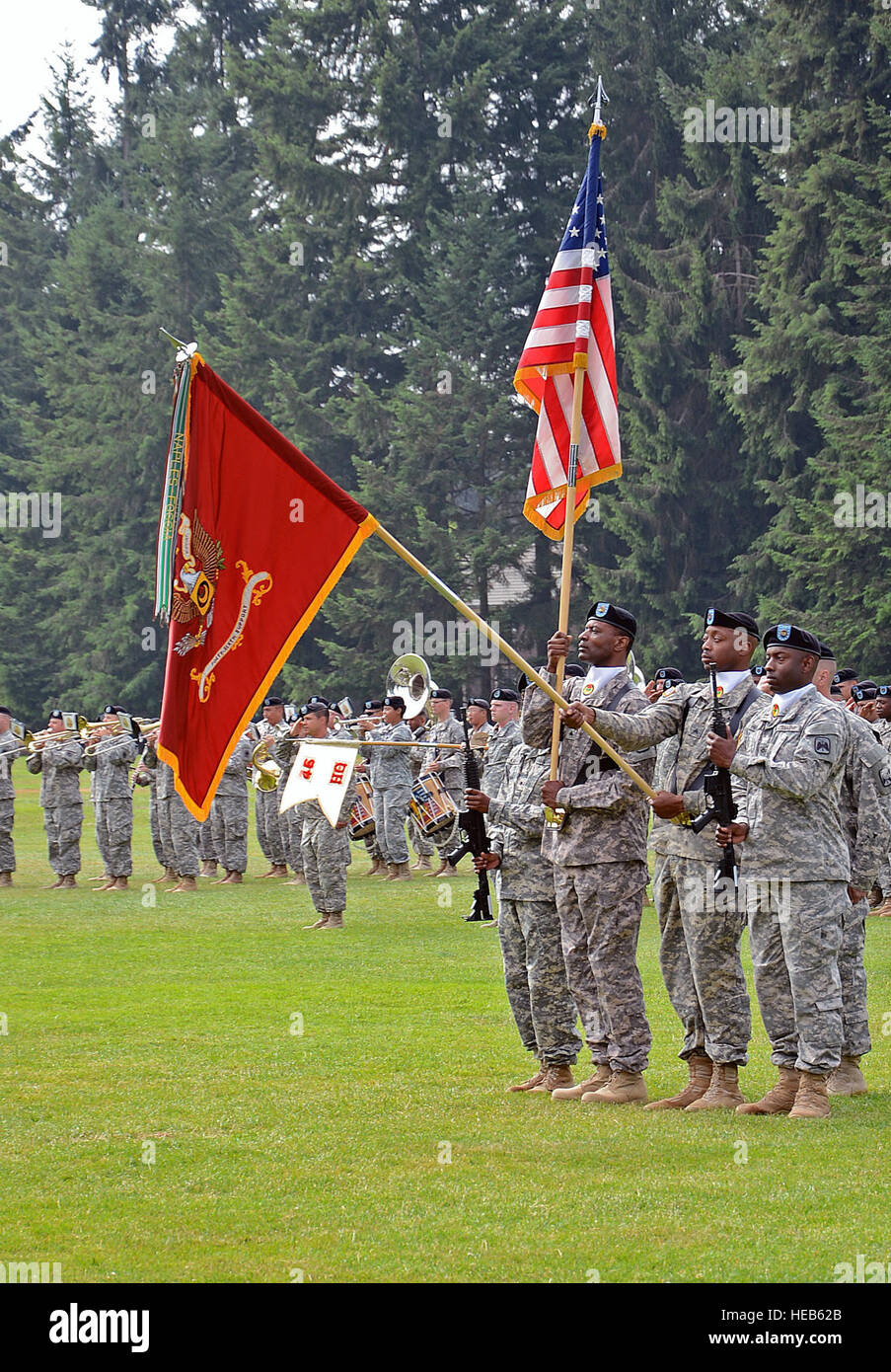 Soldiers in a color guard present the colors during a change of command ...