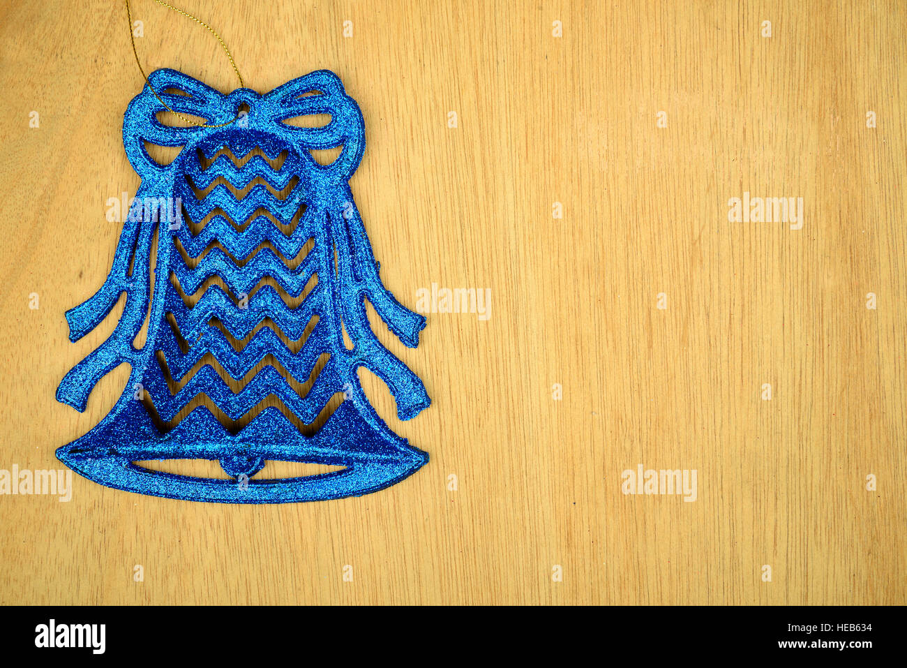 Christmas ornament on wood background. You can put your message in here ...