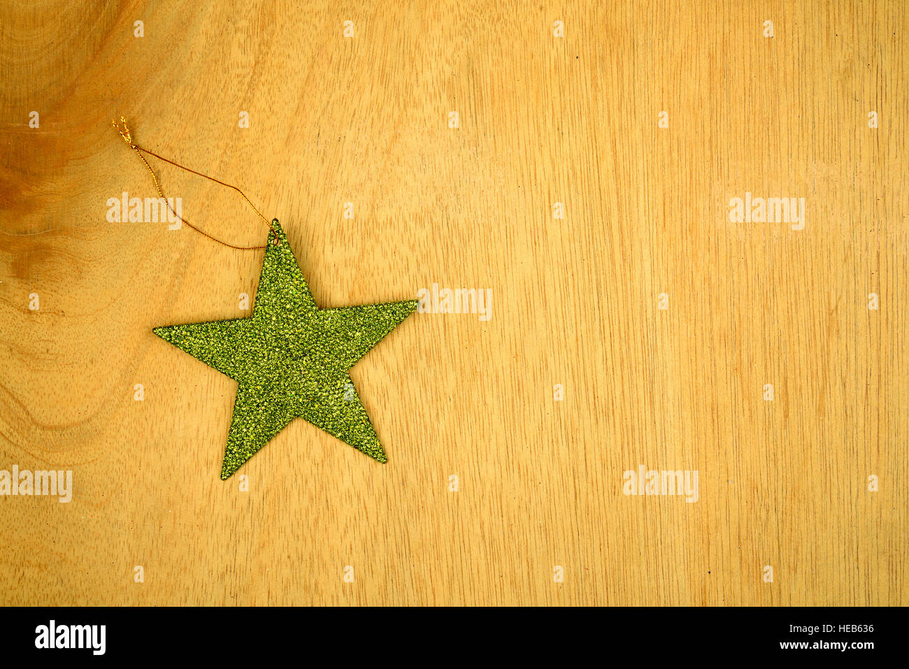 Christmas ornament on wood background. You can put your message in here ...