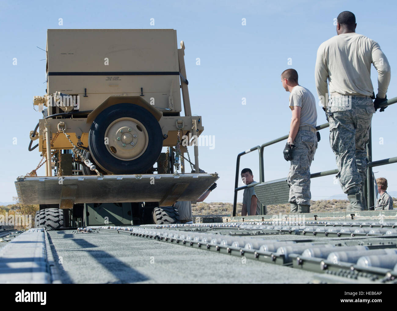 49th Materiel Maintenance Squadron personnel load cargo onto a K-Loader ...