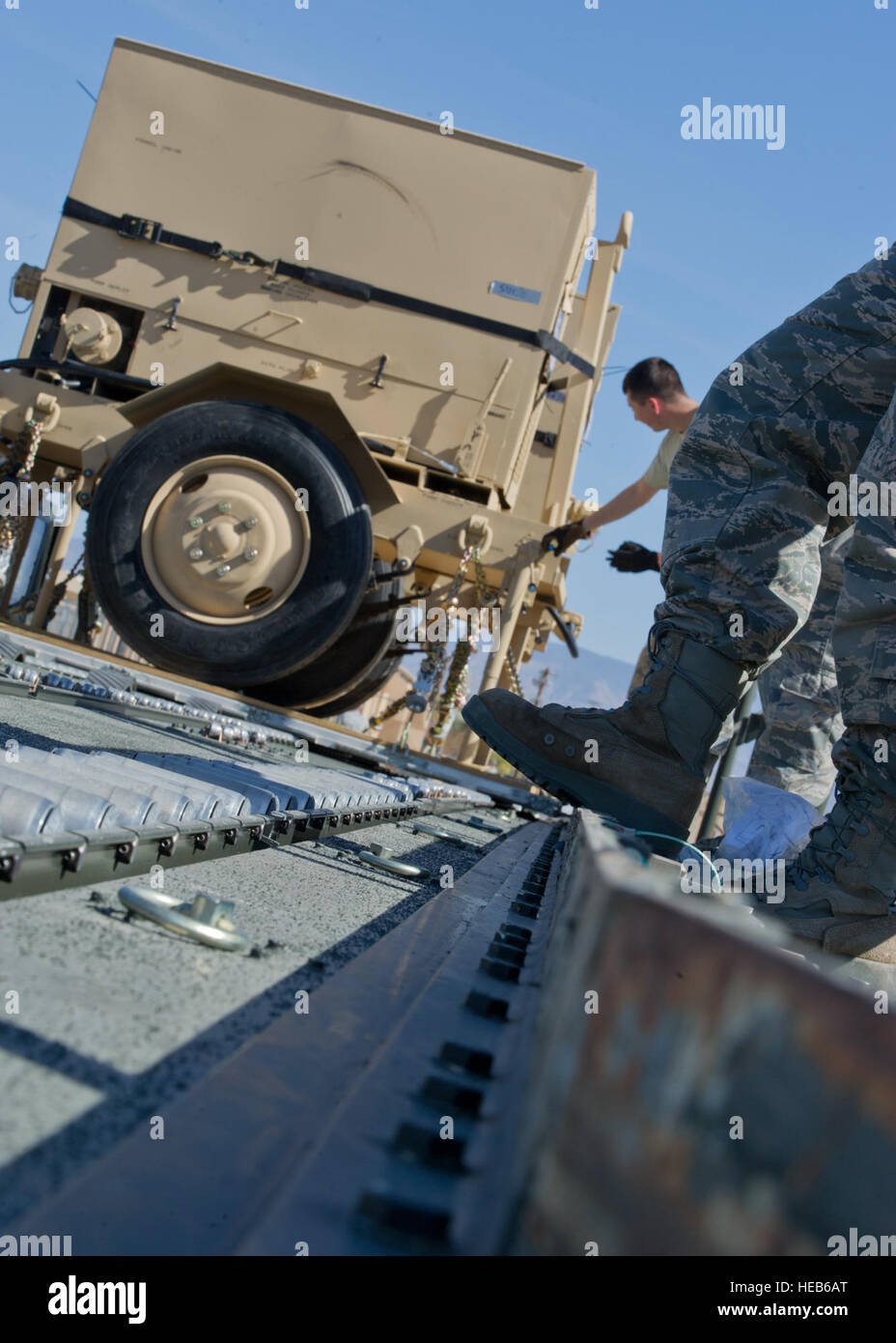 Personnel of the 49th Materiel Maintenance Squadron, load a pallet onto ...