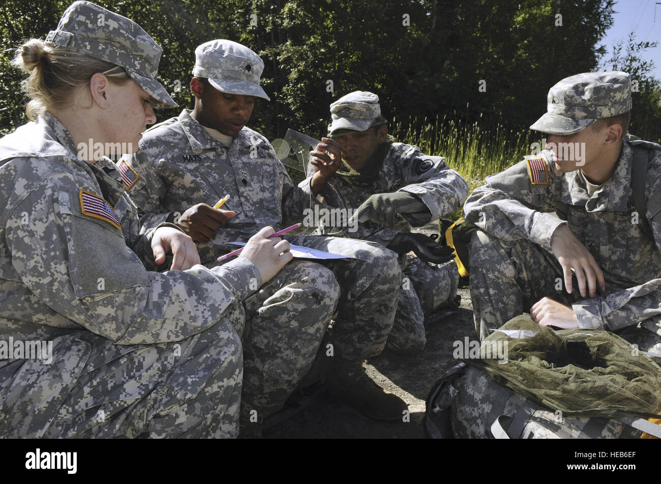 Soldiers from the 4th Quartermaster Detachment (Airborne) plot azimuths ...