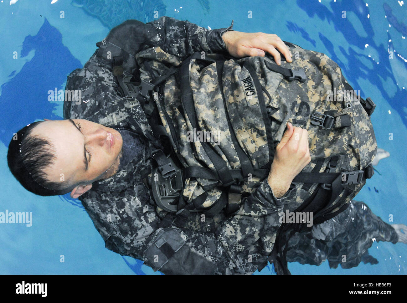Soldiers from the 4th Quartermaster Detachment conduct combat water ...