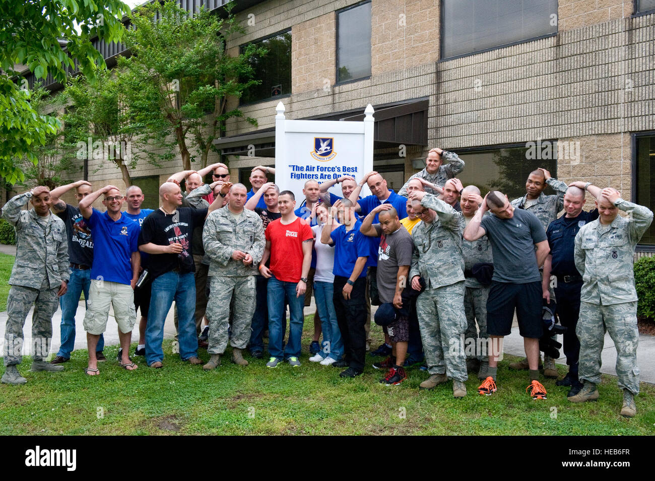 Volunteers at Seymour Johnson Air Force Base, North Carolina, shave ...