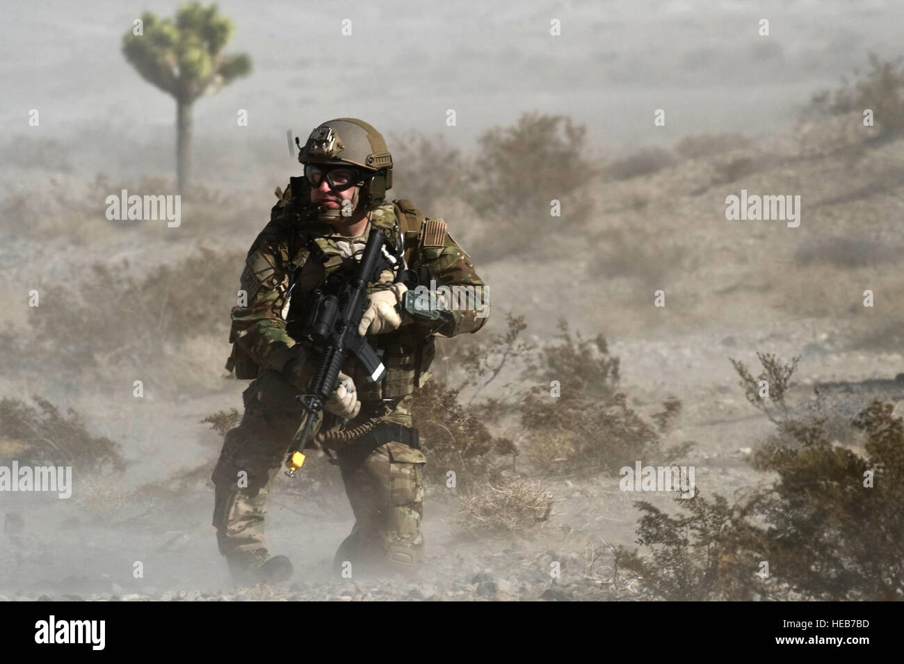 A U.S. Air Force pararescueman, 58th Rescue Squadron, secures an area ...